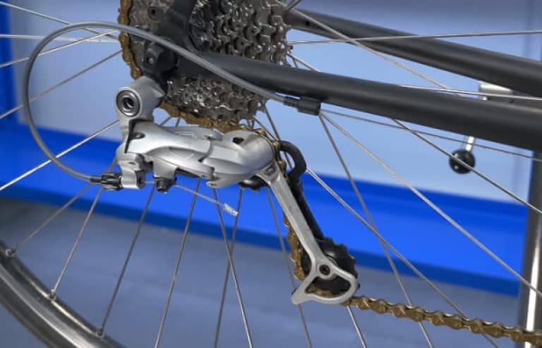 What is the difference between a long cage and short cage derailleur?